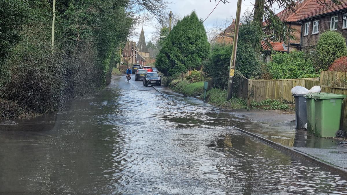 Drivers battle through the ‘Bramshott Sea’ on Church Road ...